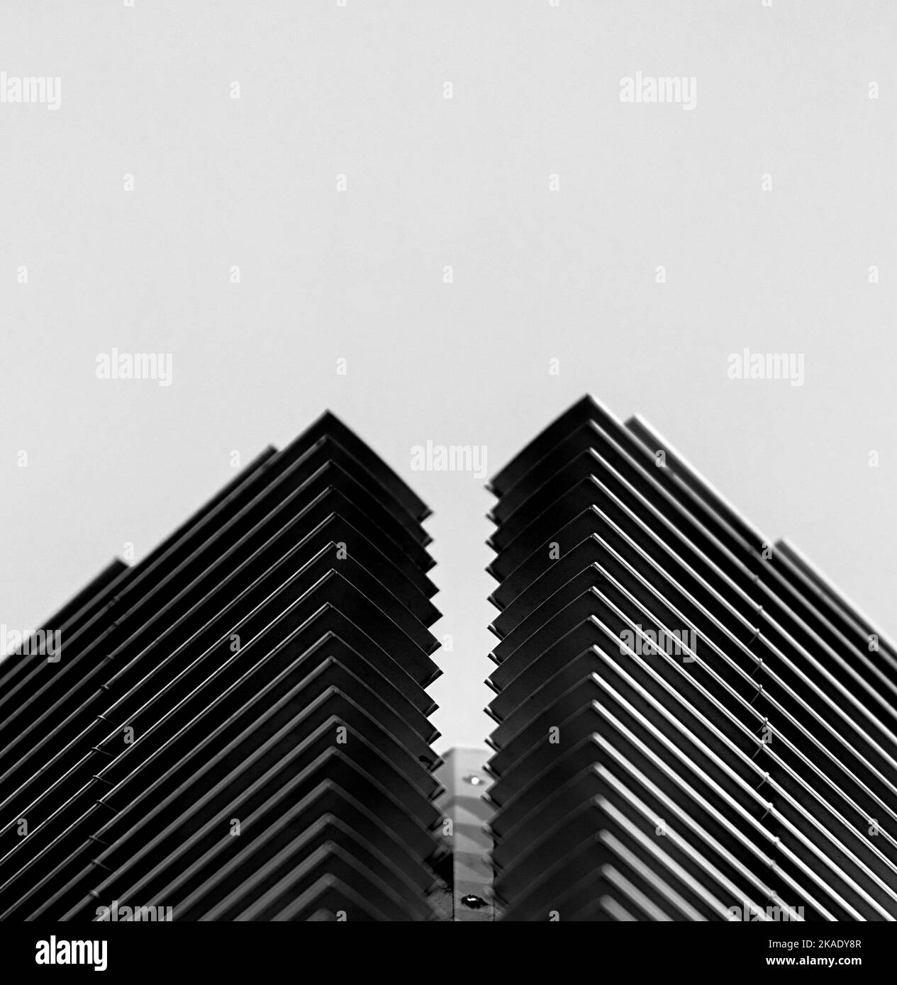 A low angle grayscale shot of angular modern buildings Stock Photo - Alamy