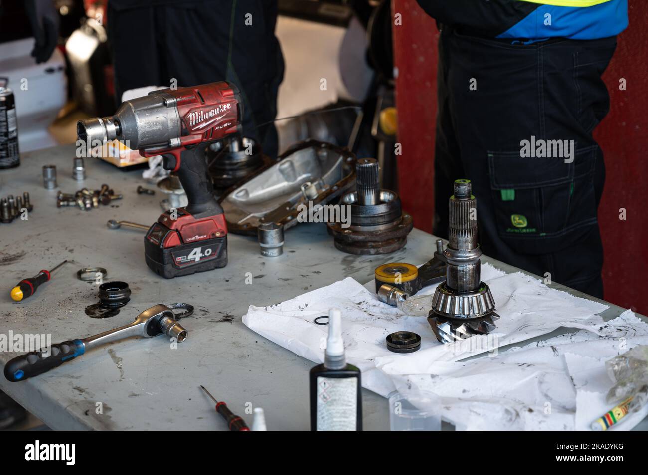A mechanic is repairing a race car Stock Photo - Alamy