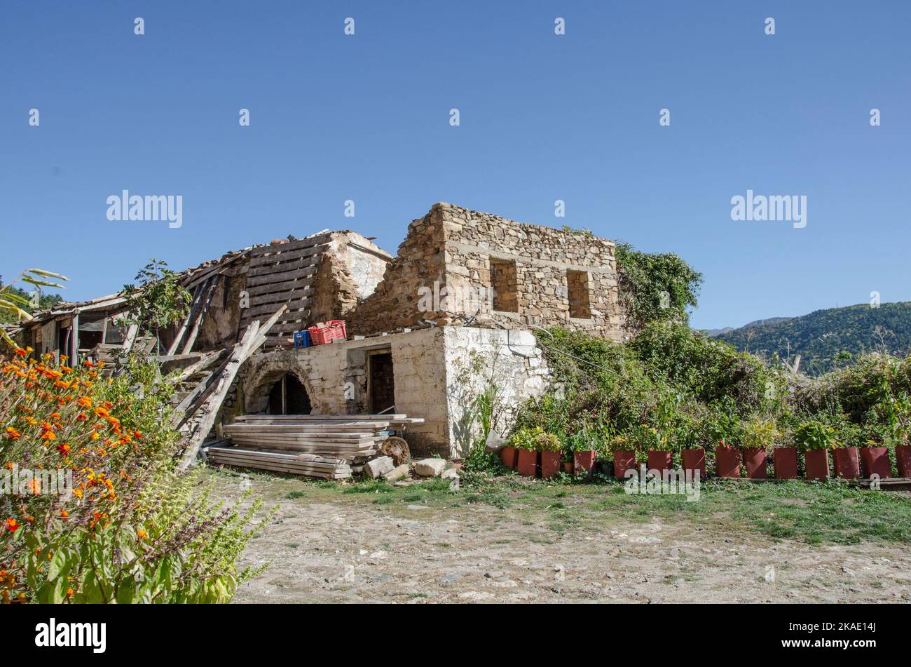 Destroyed and rebuilding old stone house,on Lake Doxa in Ancient Feneos ...