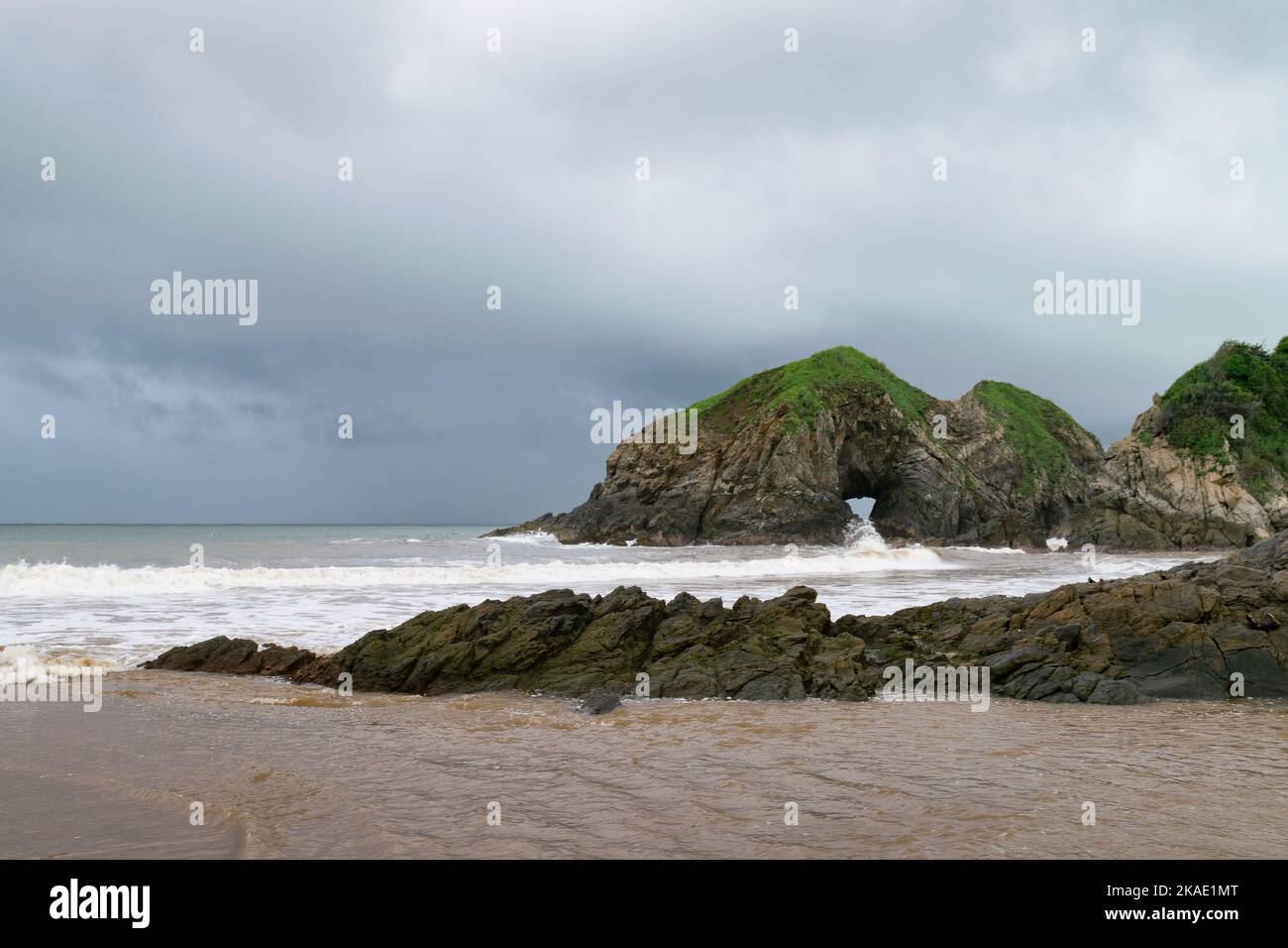 A beautiful view of the natural arch in Zipolite beach, Mexico Stock ...