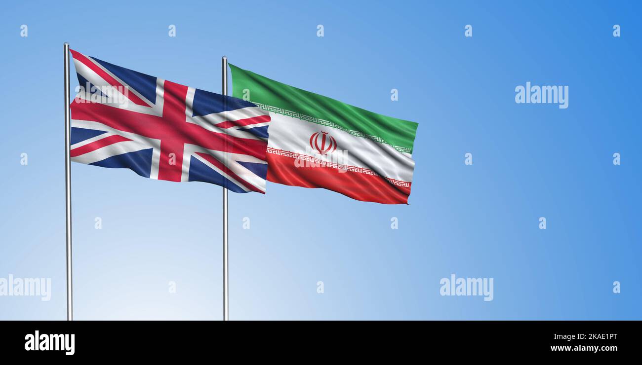 United Kingdom flag and Iran flag, with blue sky Stock Photo - Alamy