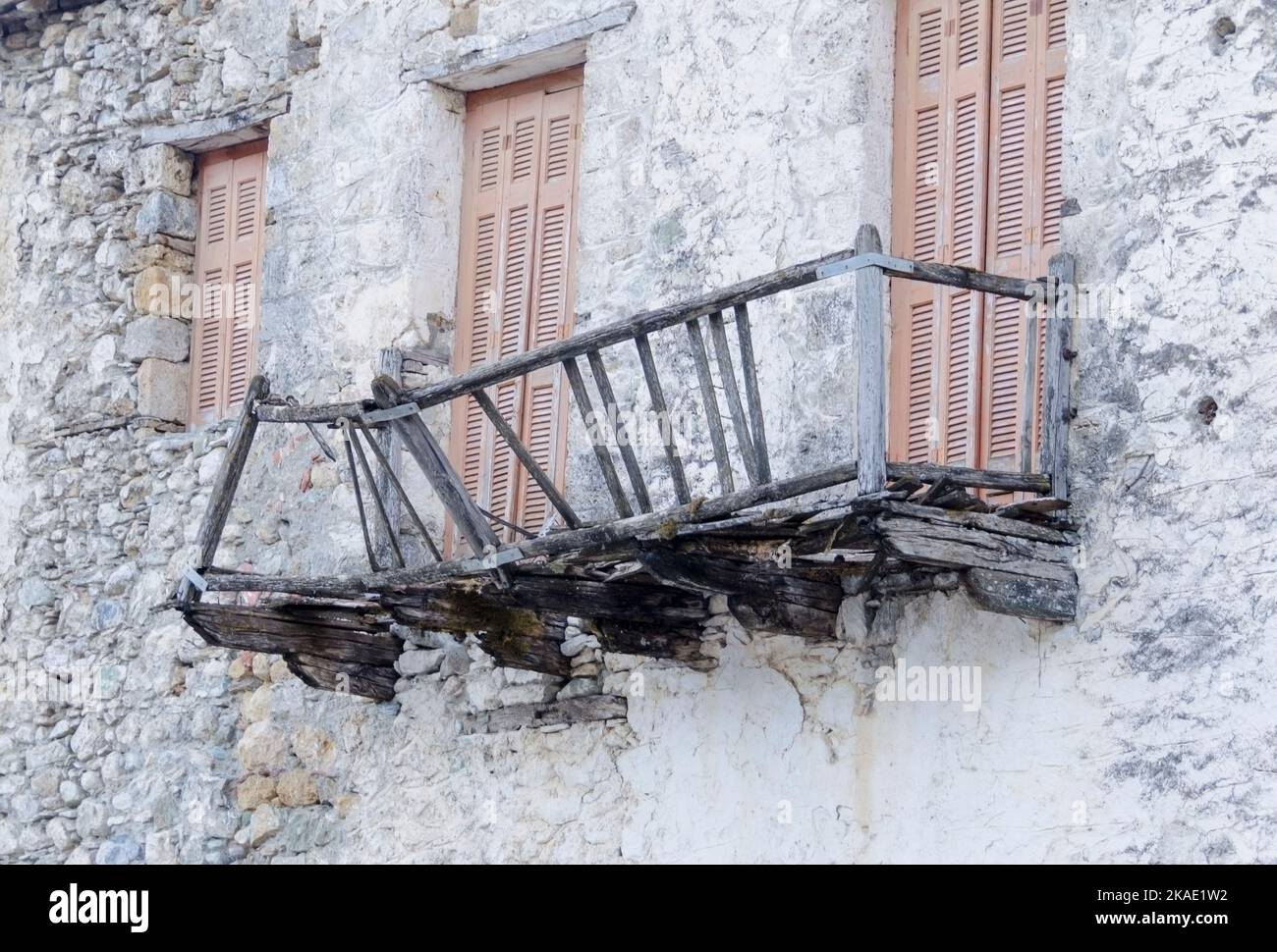 Old abandoned balcony and window on stone made house. zarouchla village ...