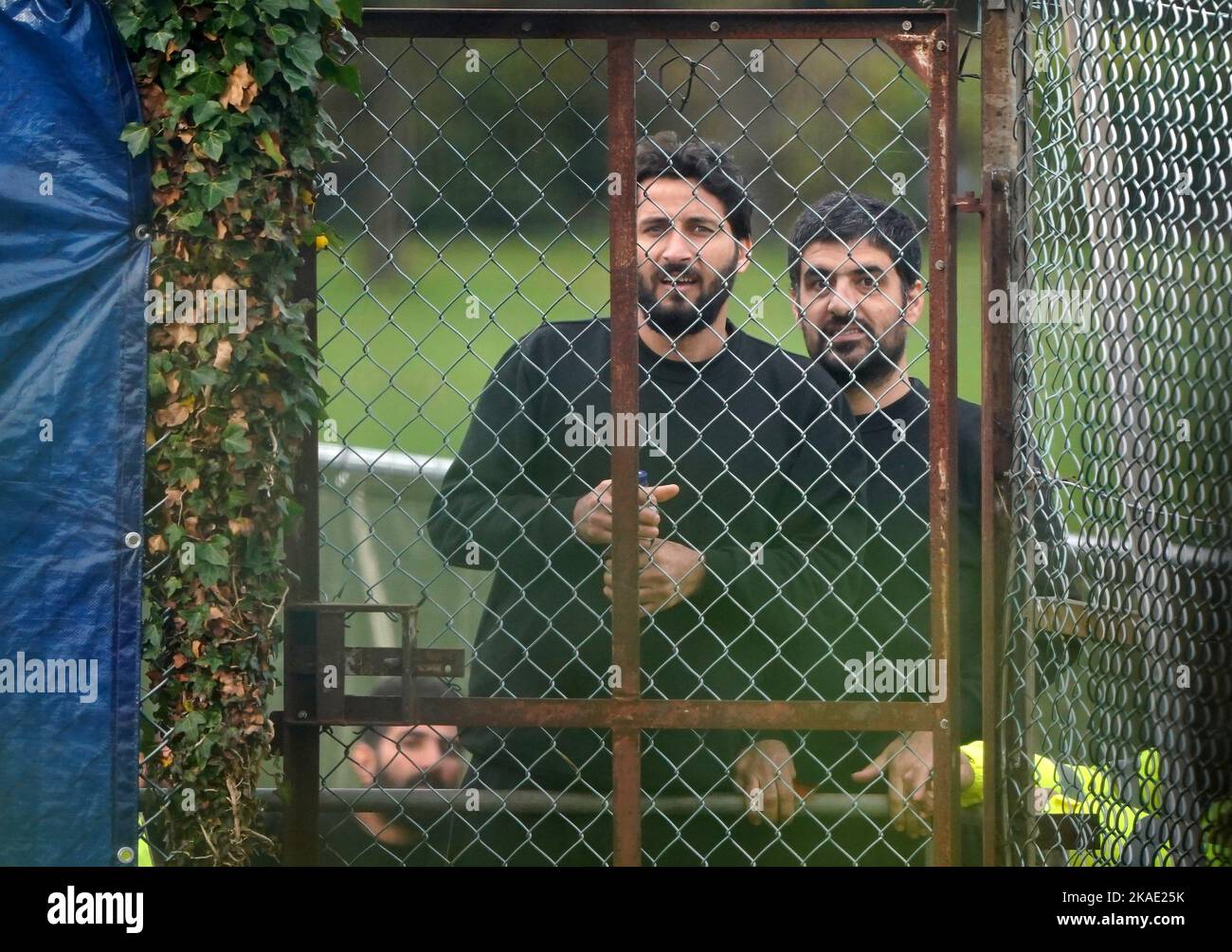 A view of people thought to be migrants inside the Manston immigration ...
