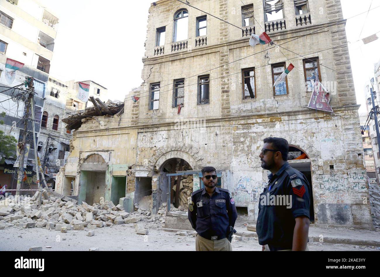 Security officials cordon off site after old building collapsed ...