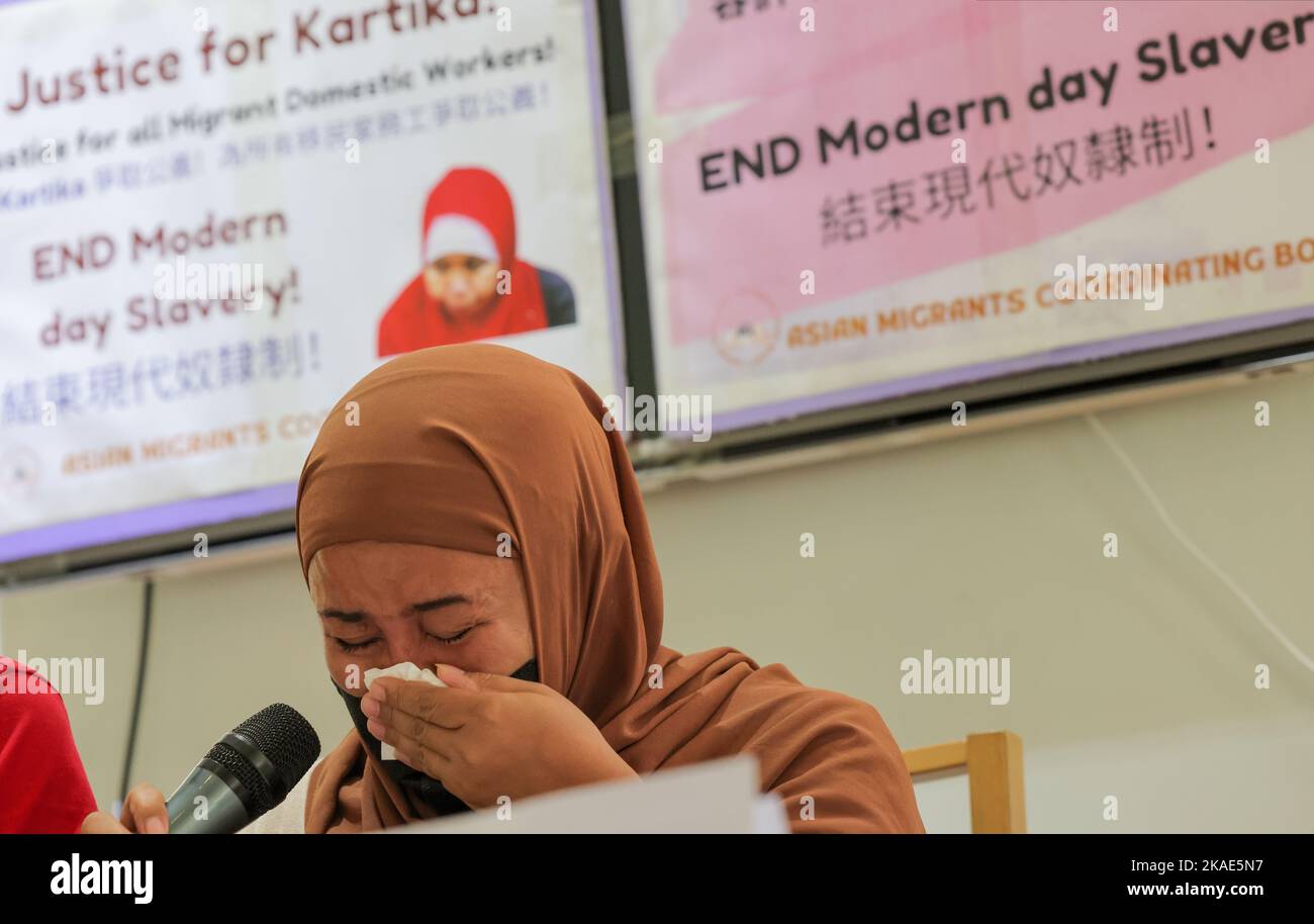 Former Indonesian domestic helper Kartika Puspitasari attends a press ...