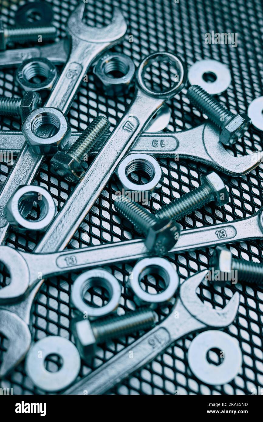 Set of chrome wrenches on steel surface. Mechanic tools for maintenance ...