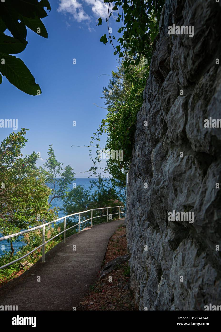 A vertical shot of a road to the beach in Moscenicka Draga, Croatia ...
