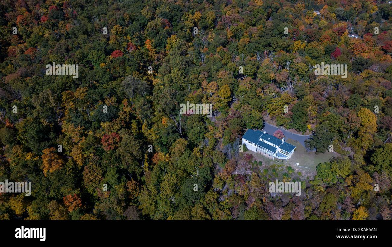 An aerial of trees in upstate New York during the colorful fall foliage ...