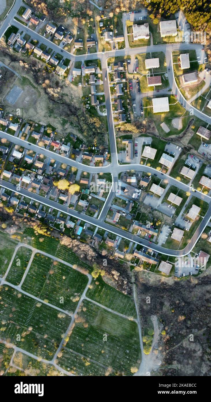 A vertical view of a part of a town with houses and streets Stock Photo ...