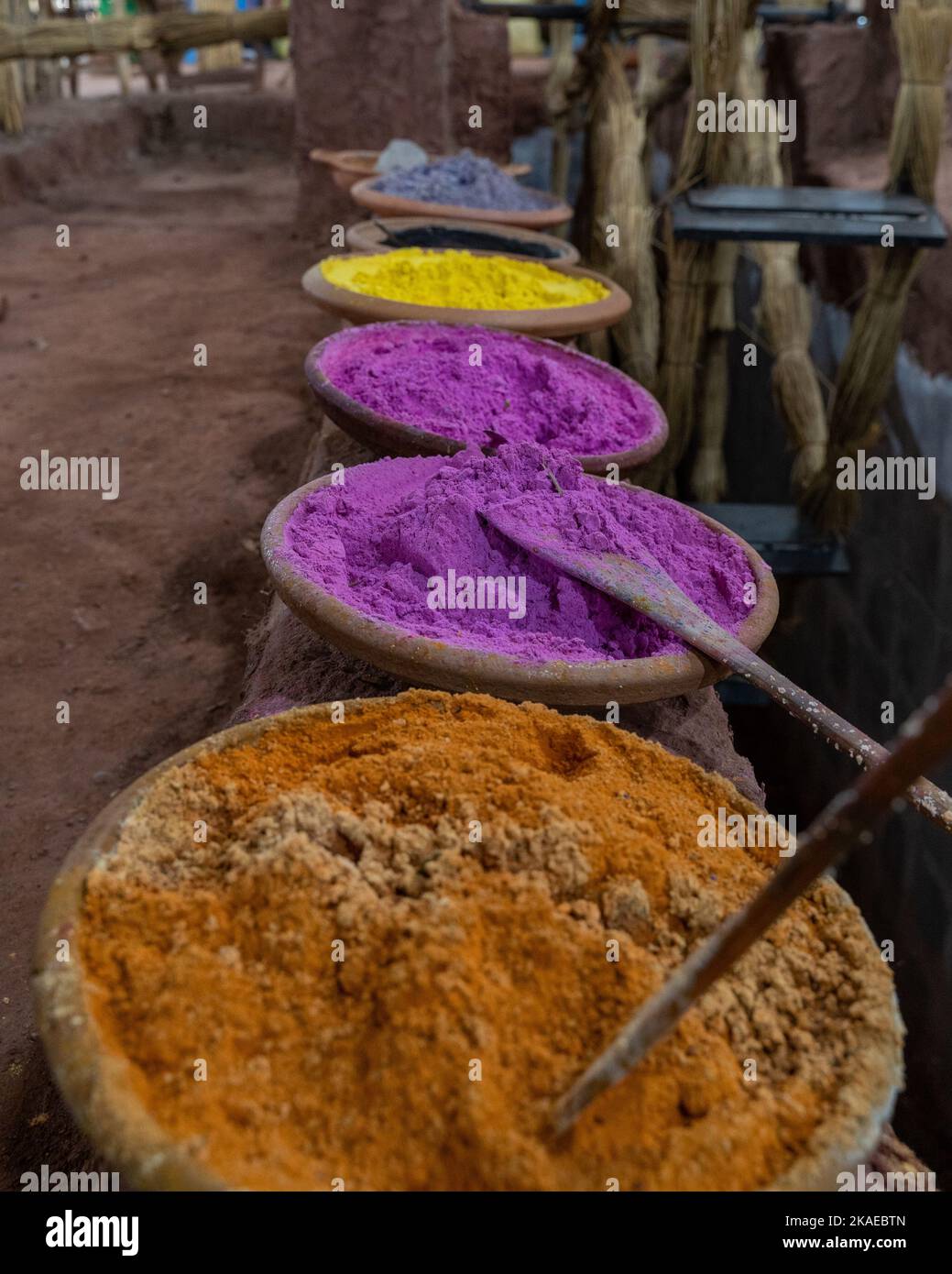 A vertical shot of the colorful dyes made from natural minerals in big ...