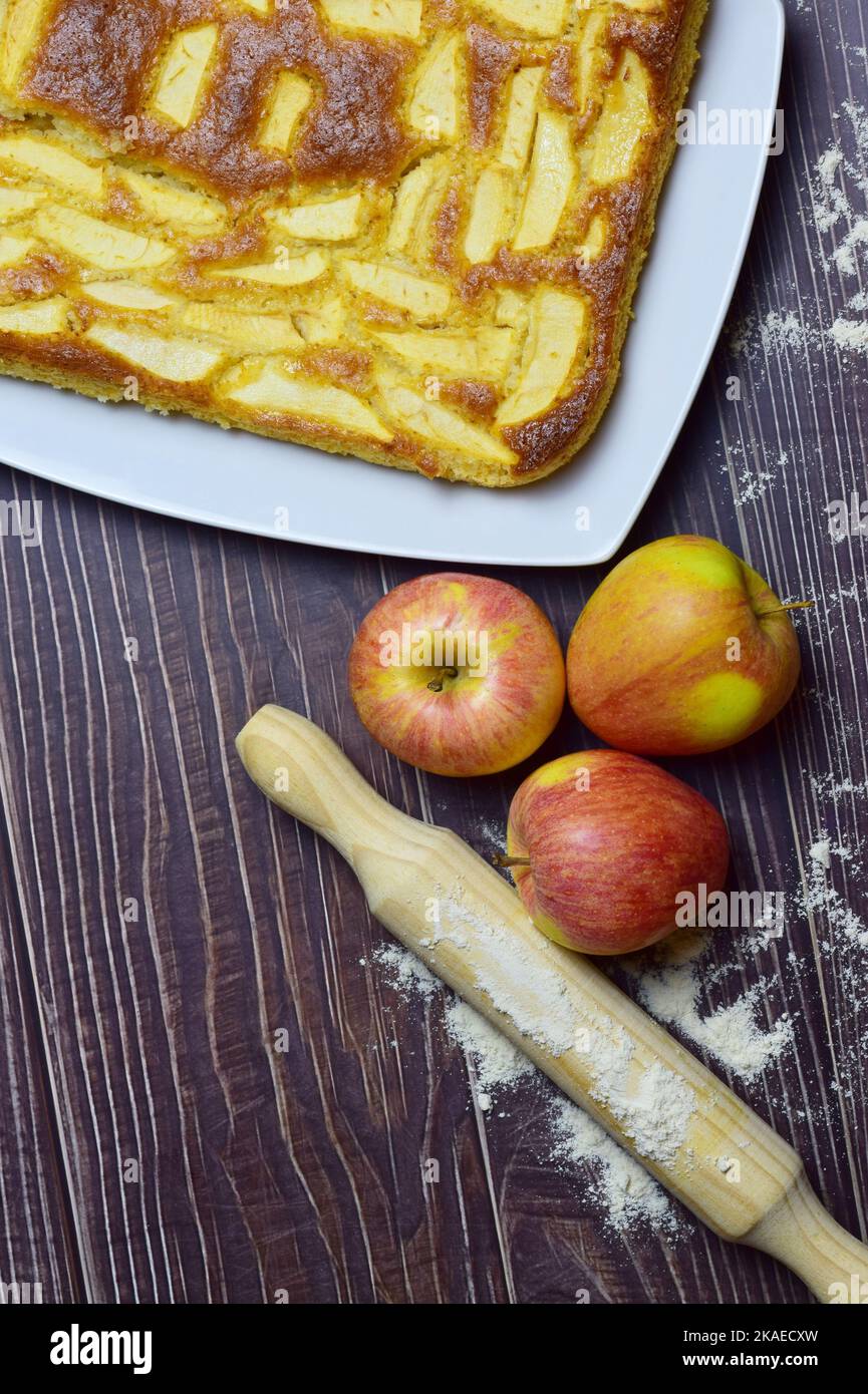 Homemade apple pie, white rectangular plate on brown rustic wood Stock ...