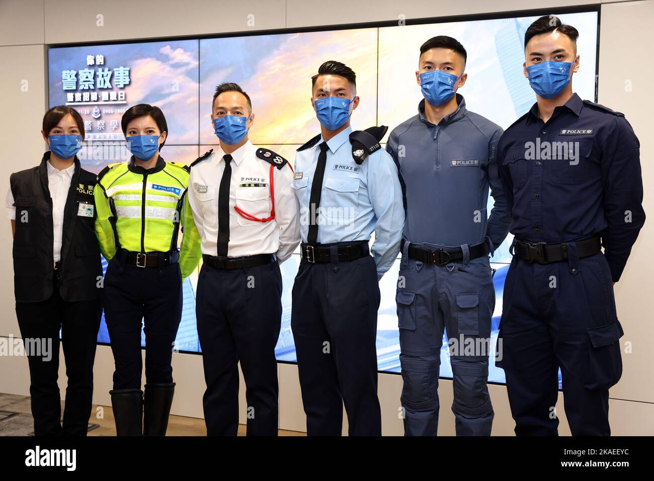 Deputy police chief Chow Yat-ming (third from left) poses with other ...