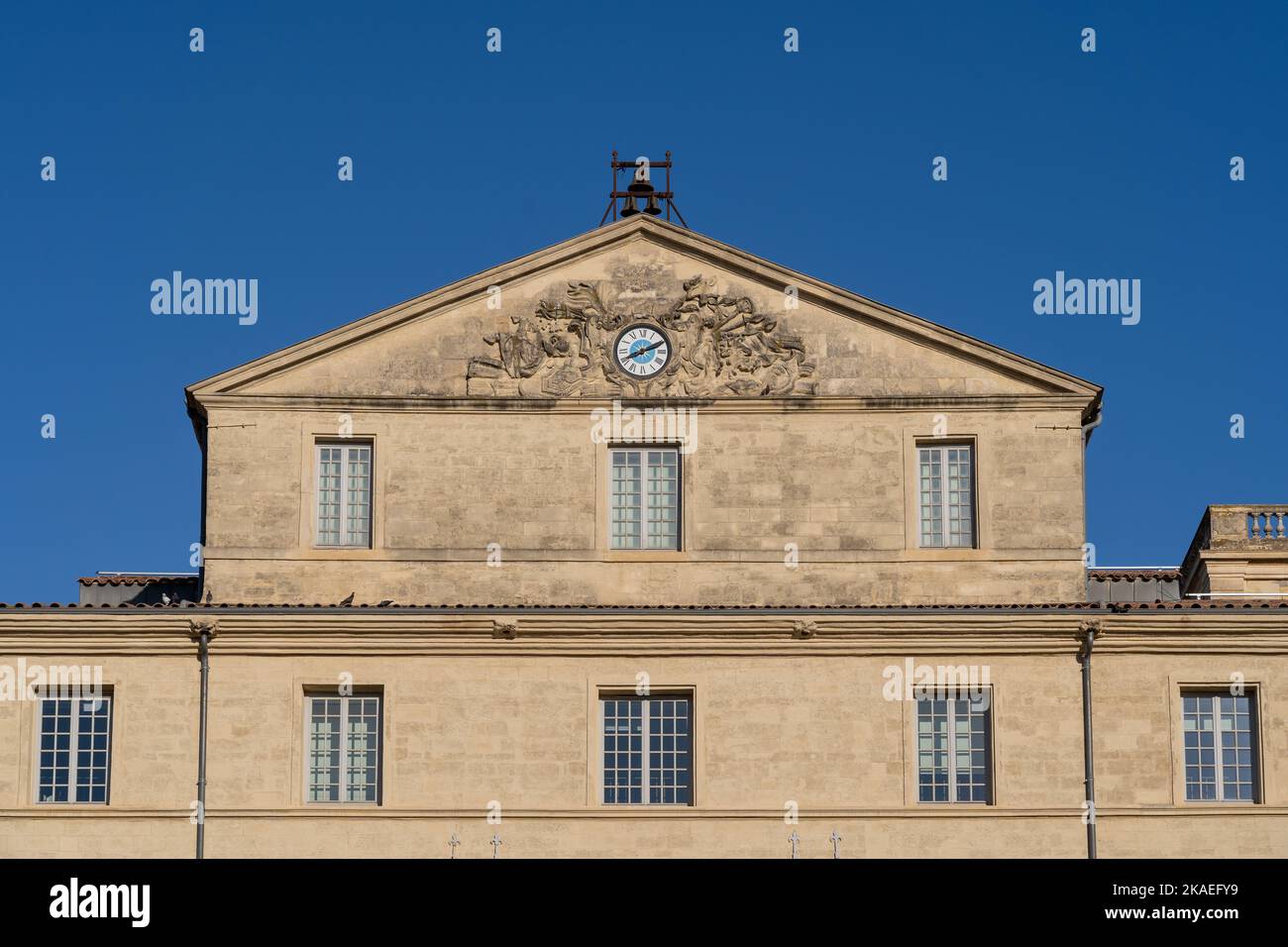 Detail view of the ancient stone facade of Hotel de Massilian, an ...