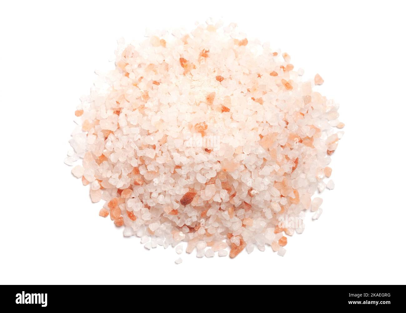 Heap of large crystals pink Himalayan salt isolated on white background ...