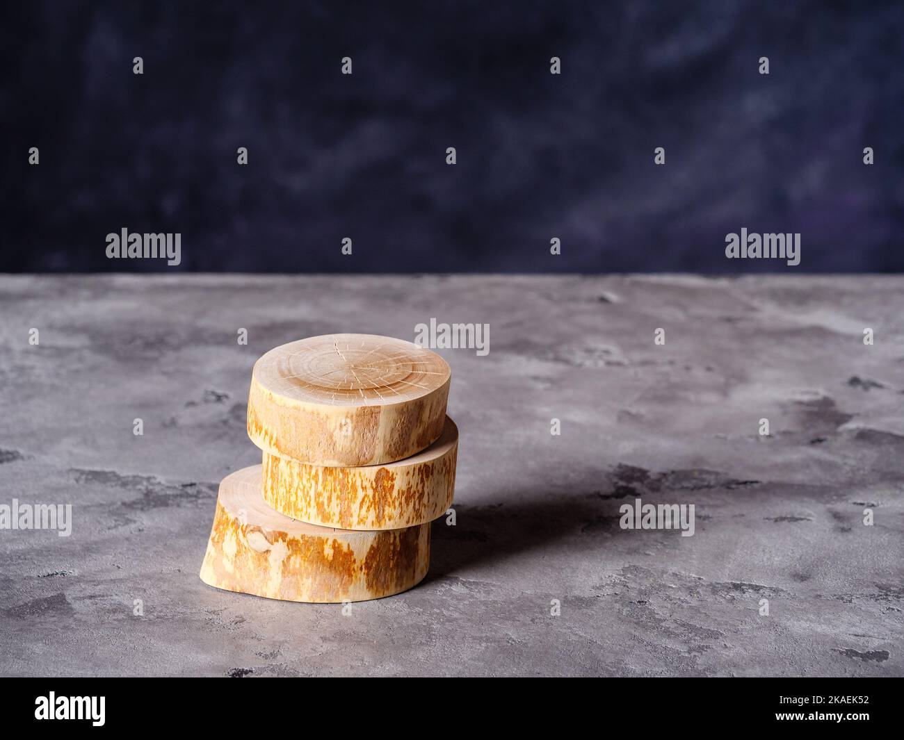 3 wooden podiums for product presentation on concrete background Stock ...