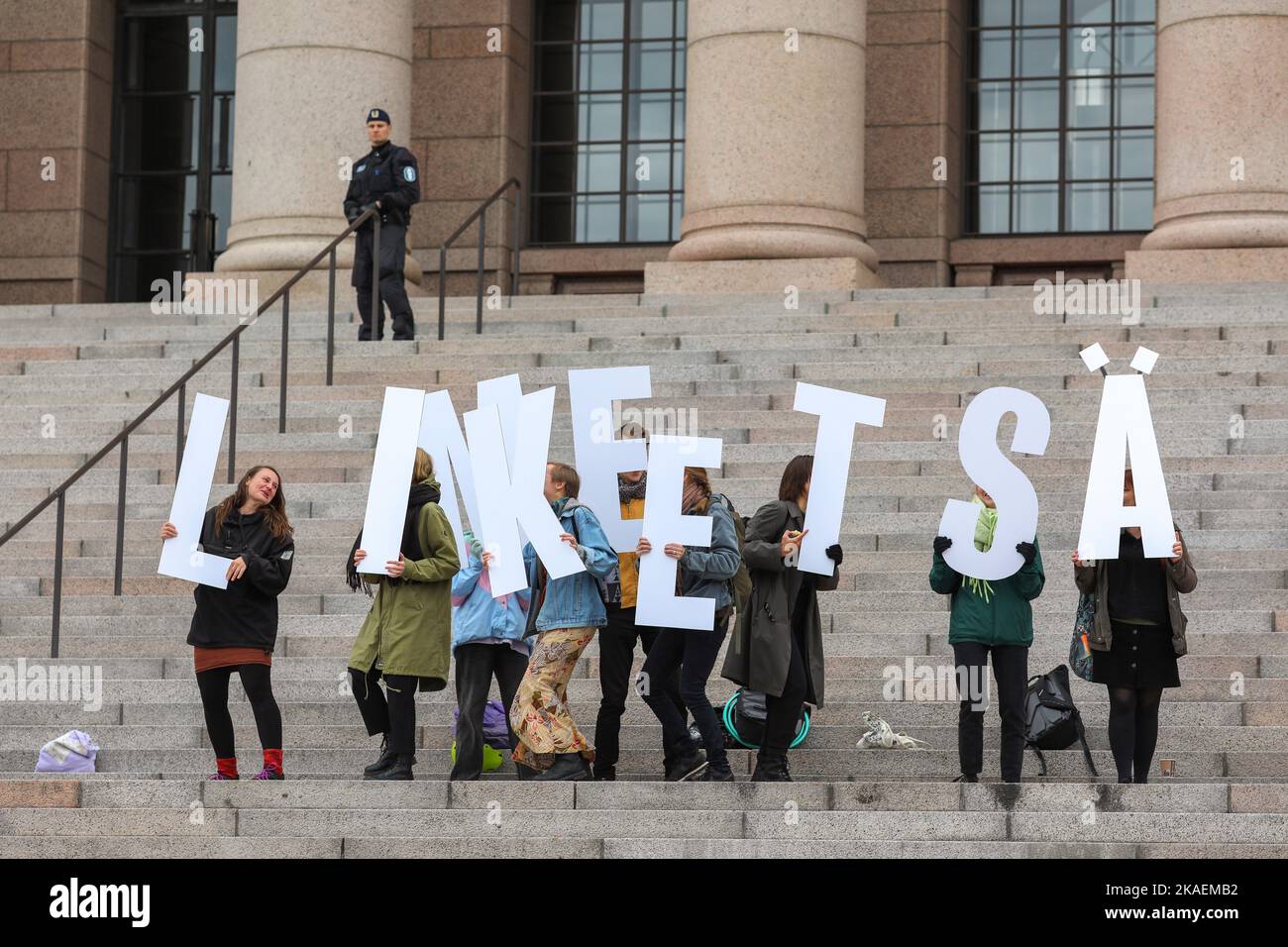 The defenders of the forest hold placards on the steps of the ...