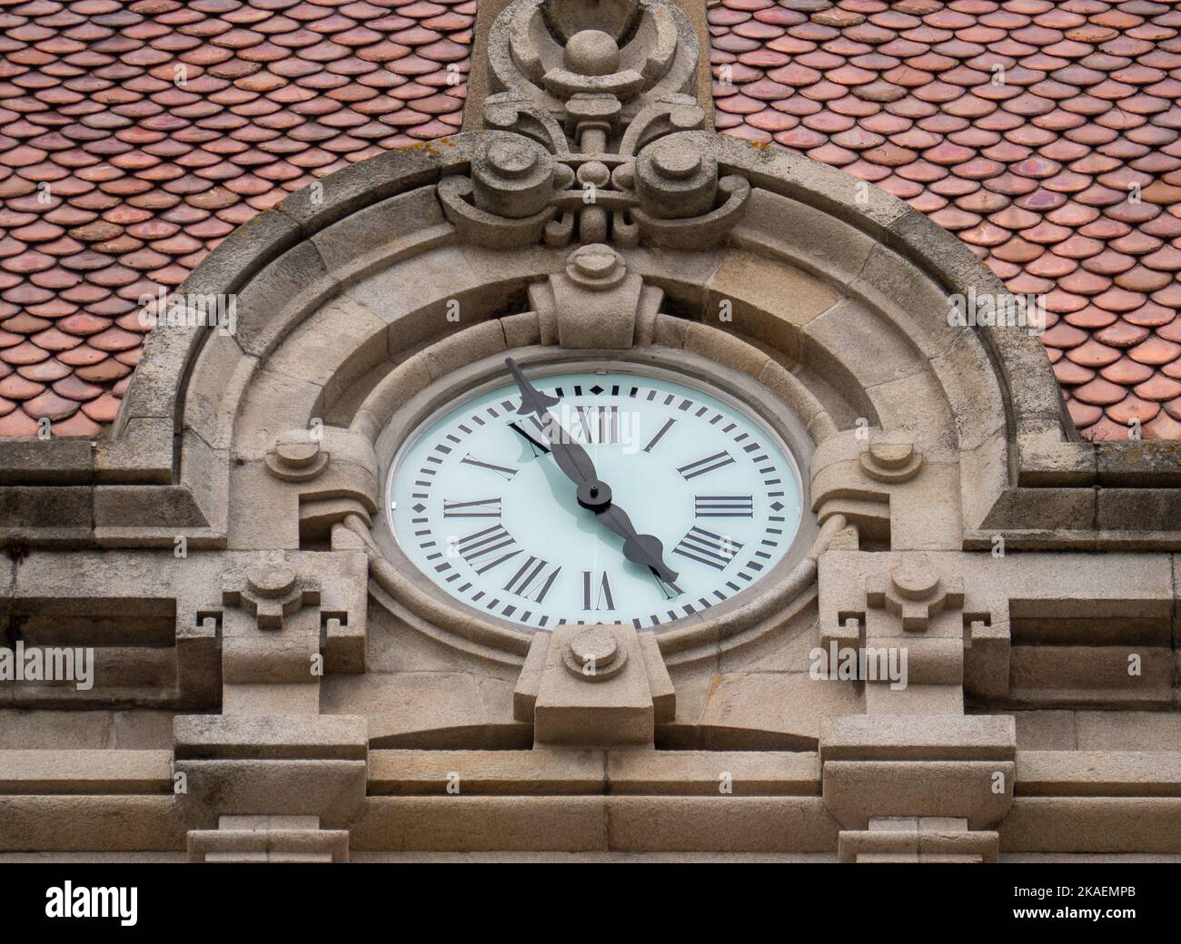 A clock on the wall of a medieval building Stock Photo - Alamy