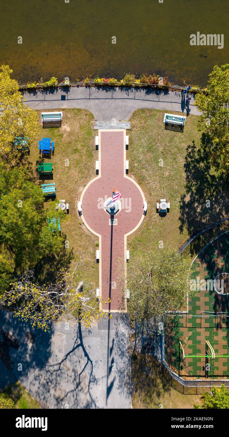 A vertical aerial top view of a playground in a sunny empty park Stock ...