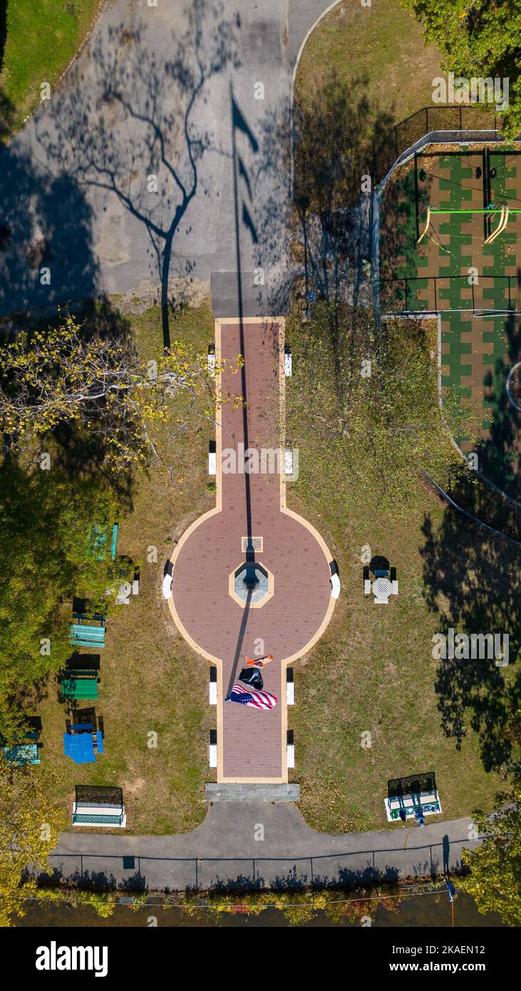 A vertical aerial top view of a playground in a sunny empty park Stock ...