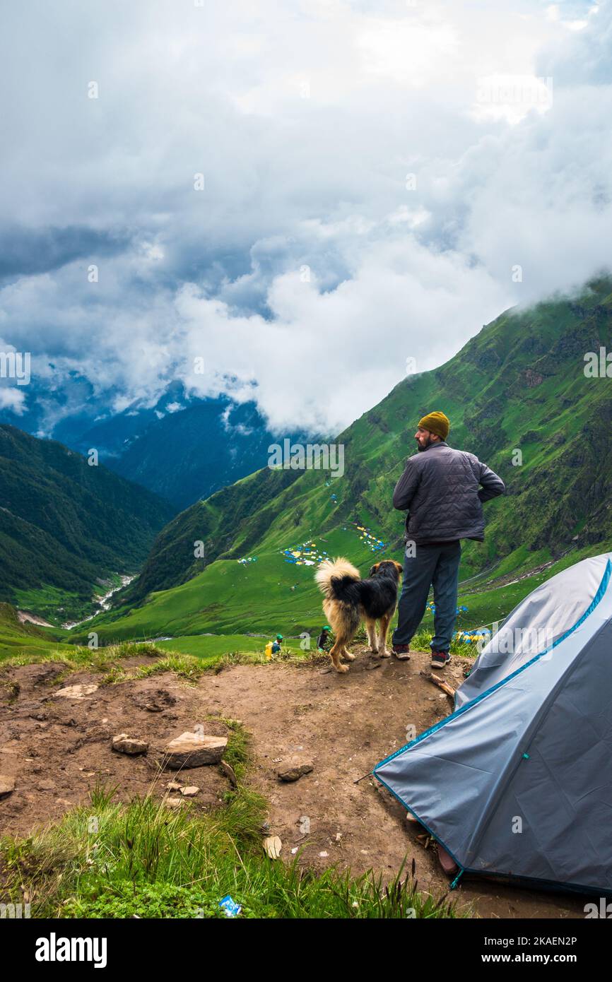 July 14th 2022, Himachal Pradesh India. A man with his himalayan ...