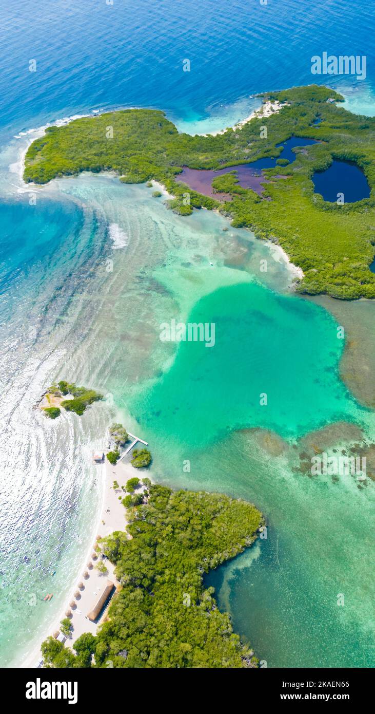 A vertical aerial view of a blue lagoon on a bright sunny day Stock ...