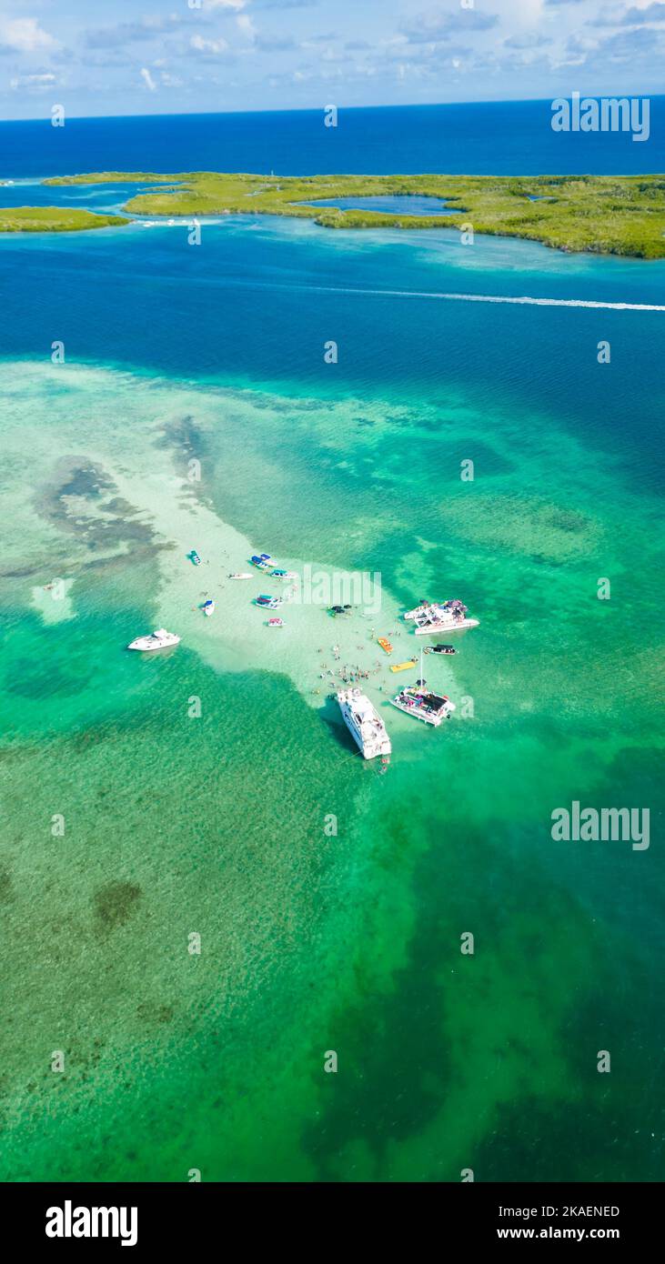 A vertical aerial view of a blue lagoon on a bright sunny day Stock ...