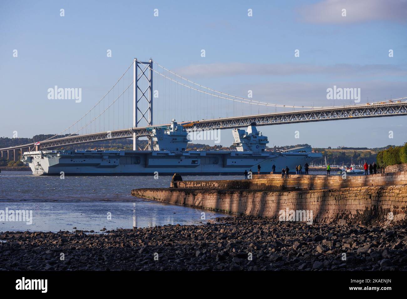 HMS Prince of Wales passing underneath the Forth Road Bridge returning ...