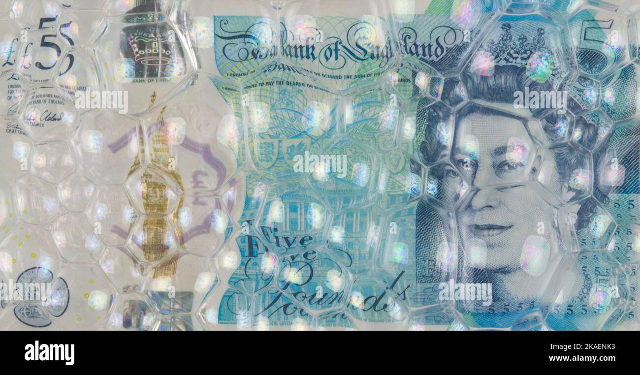 Concept picture of five pound note with bubbles Stock Photo - Alamy