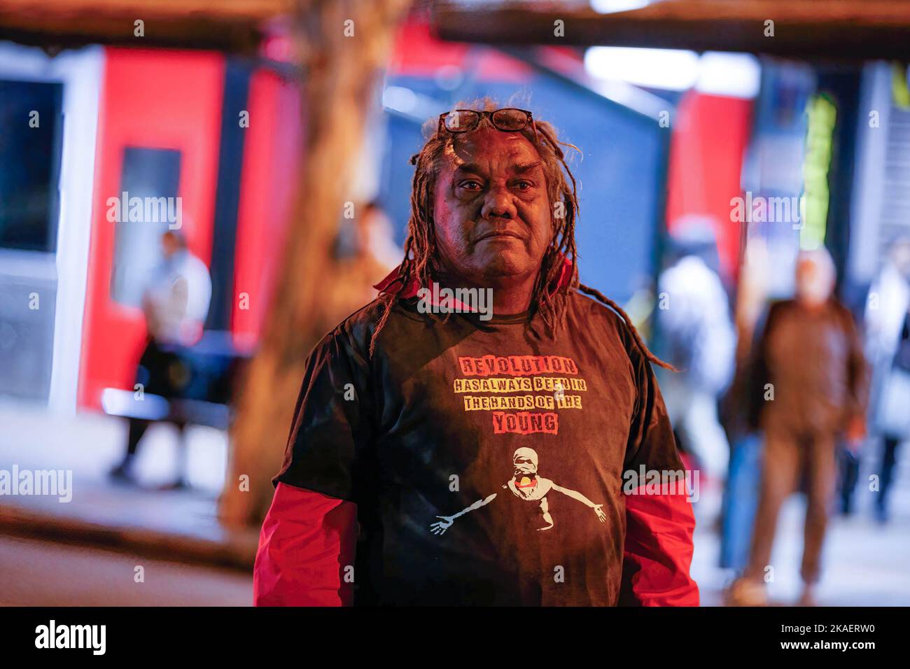 Aboriginal activist Wayne Wharton walks through Adelaide Street during ...
