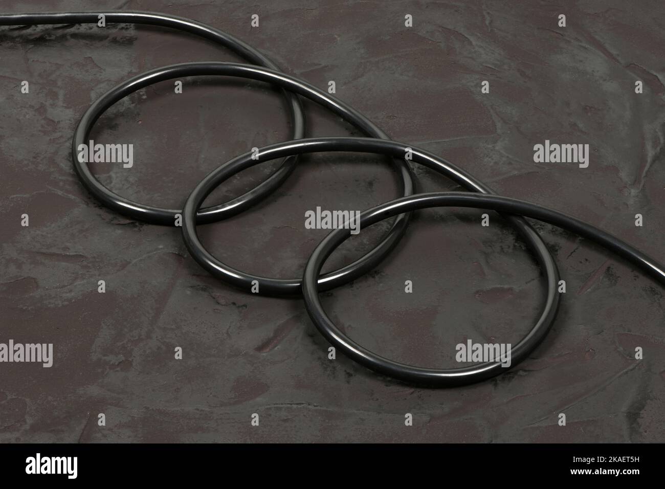 Black wire isolated on black background abstraction. High resolution ...