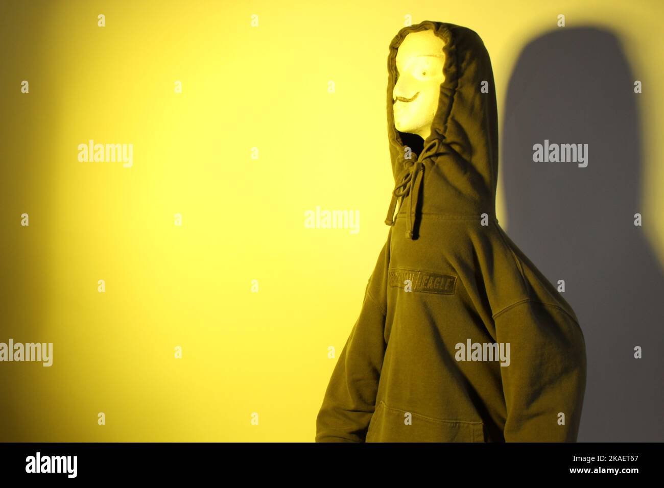 mannequin man with yellow background Stock Photo - Alamy
