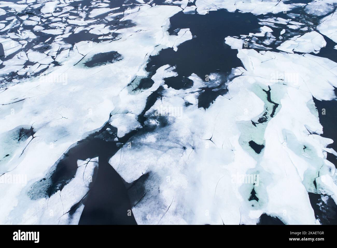 Open water fractured shelf ice from a melting glacier Stock Photo - Alamy