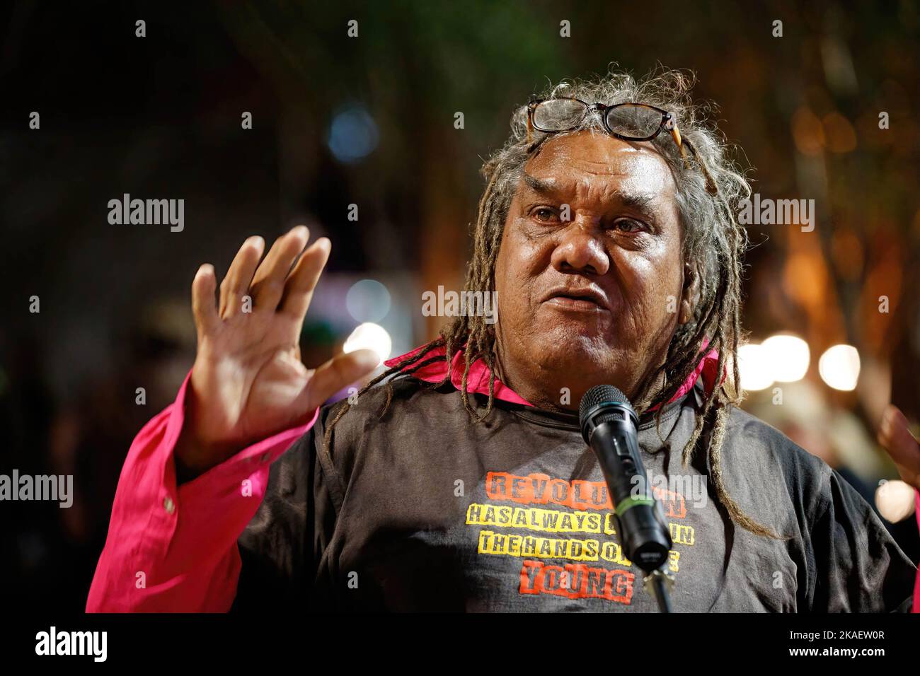 Aboriginal activist Wayne Wharton speaks to the crowd during a ...