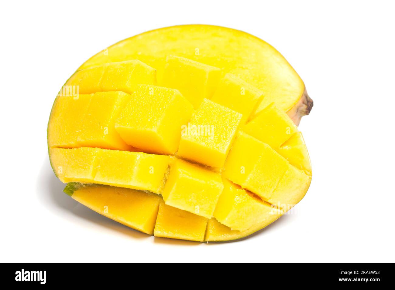 chopped half of ripe mango fruit isolated on white background Stock ...