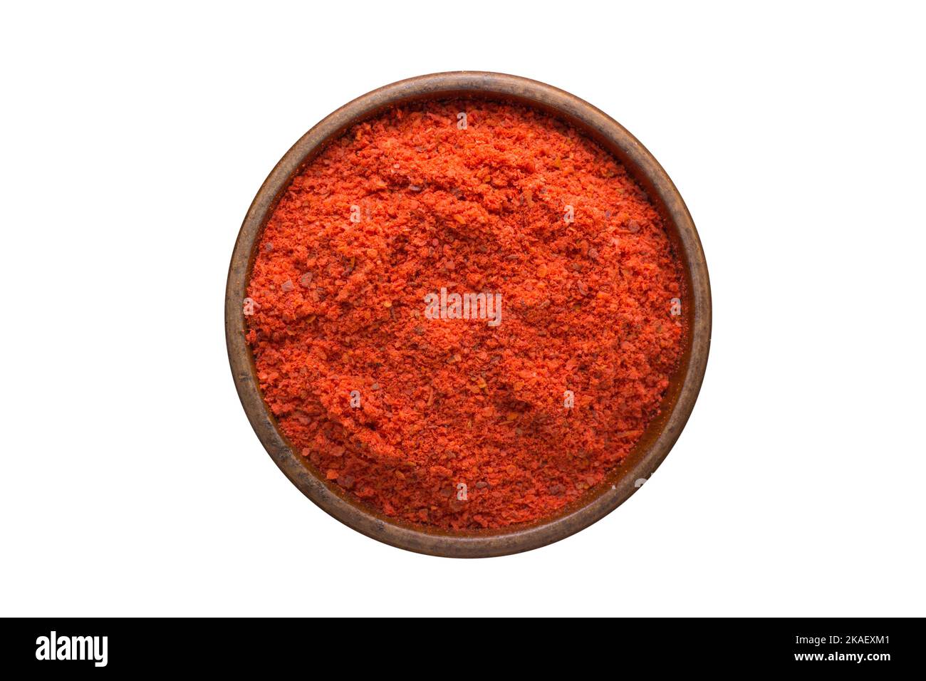 Adjika powder seasoning in a wooden bowl, top view. spice isolated on ...
