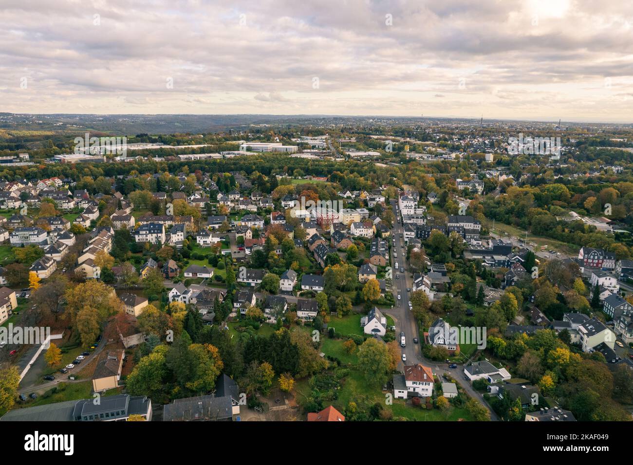 An aerial view of the buildings and green trees in the town of Solingen ...