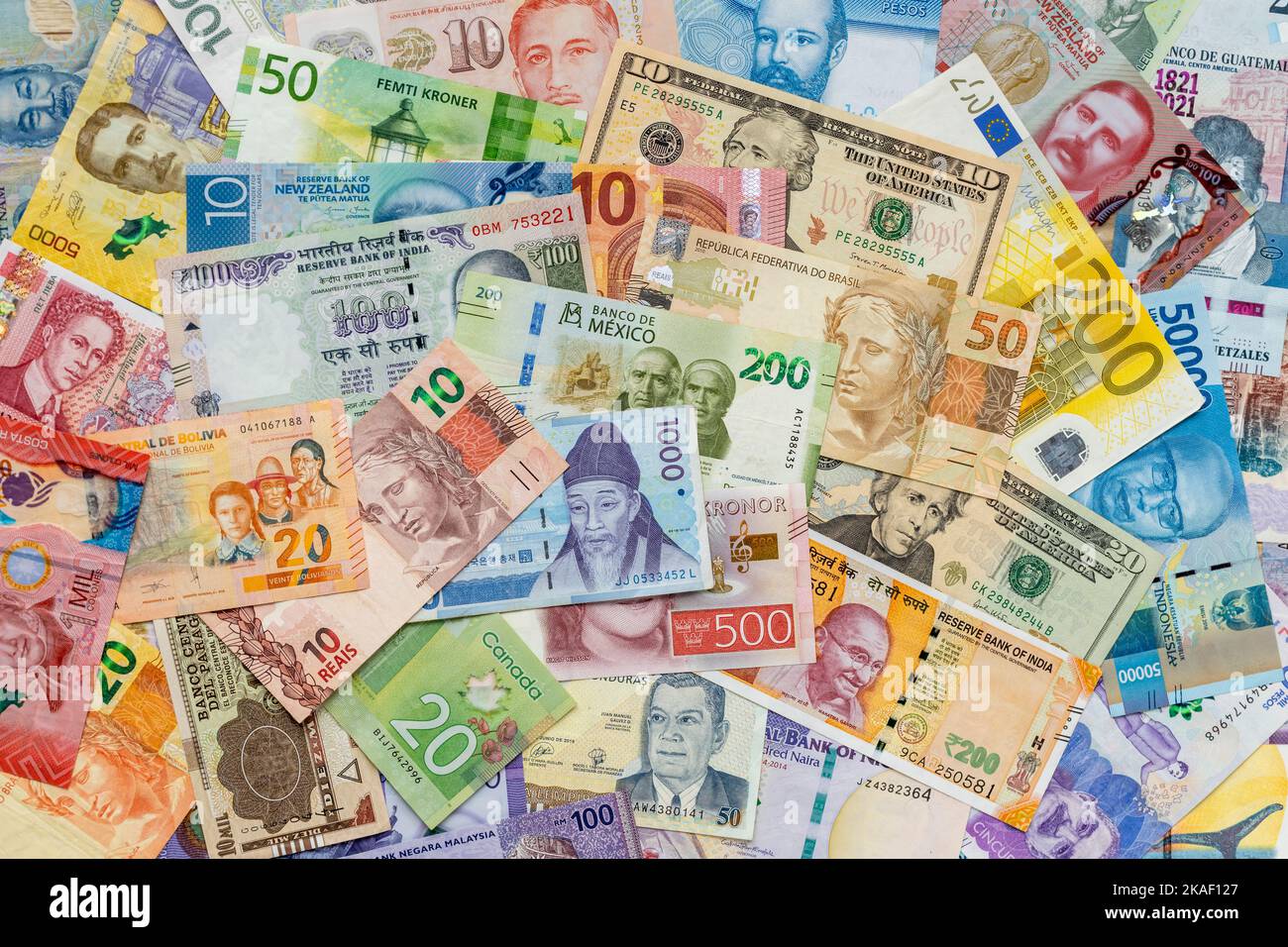 A lot of mixed money from around the world, Financial concept, top view ...