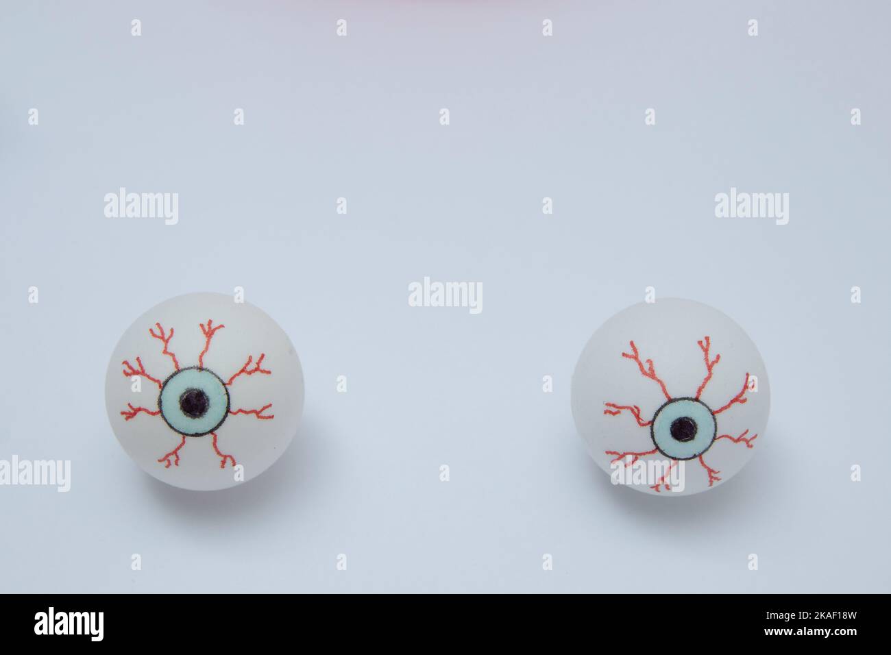 The creepy eyes on white background with copy space - Halloween concept ...