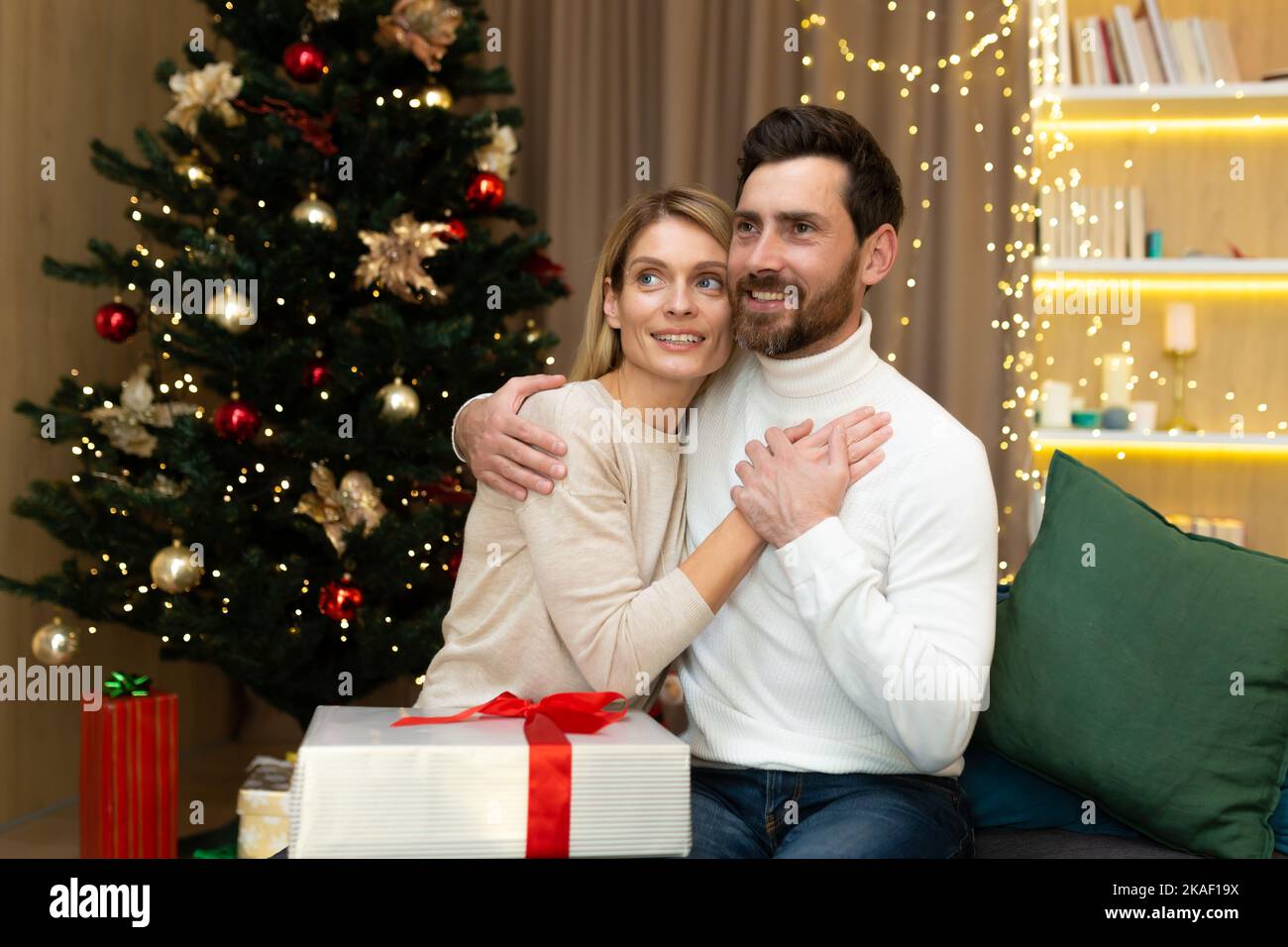 Home happy family couple christmas tree hi-res stock photography and ...