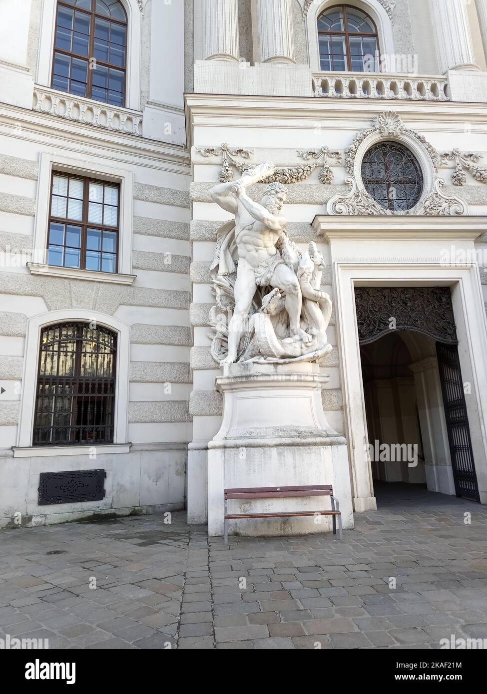 A vertical shot of Hercules fighting the Hydra statue in front of ...