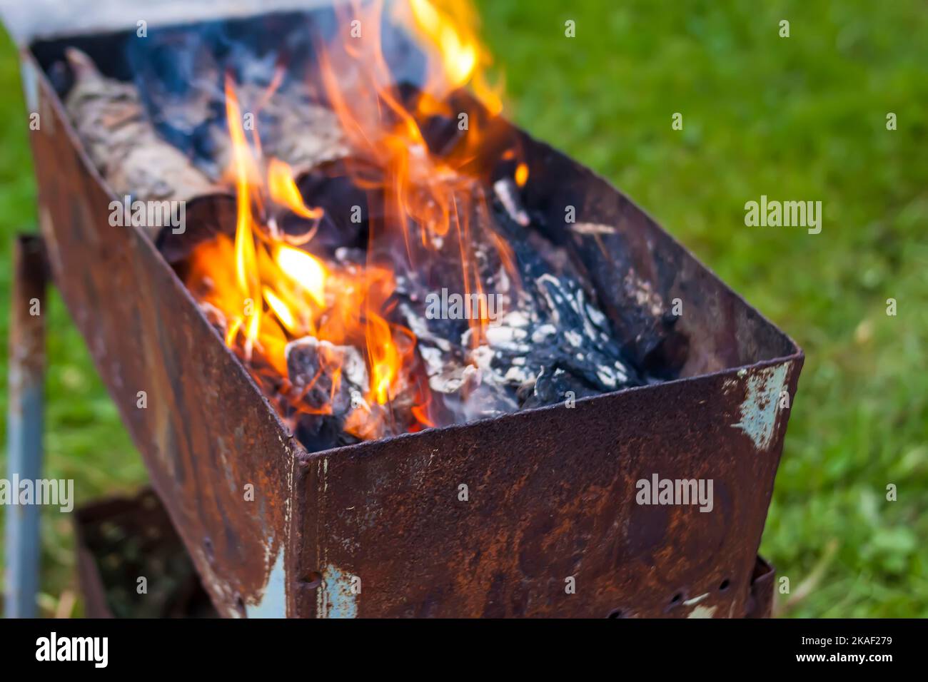 Flame of fire burning in the brazier Stock Photo - Alamy