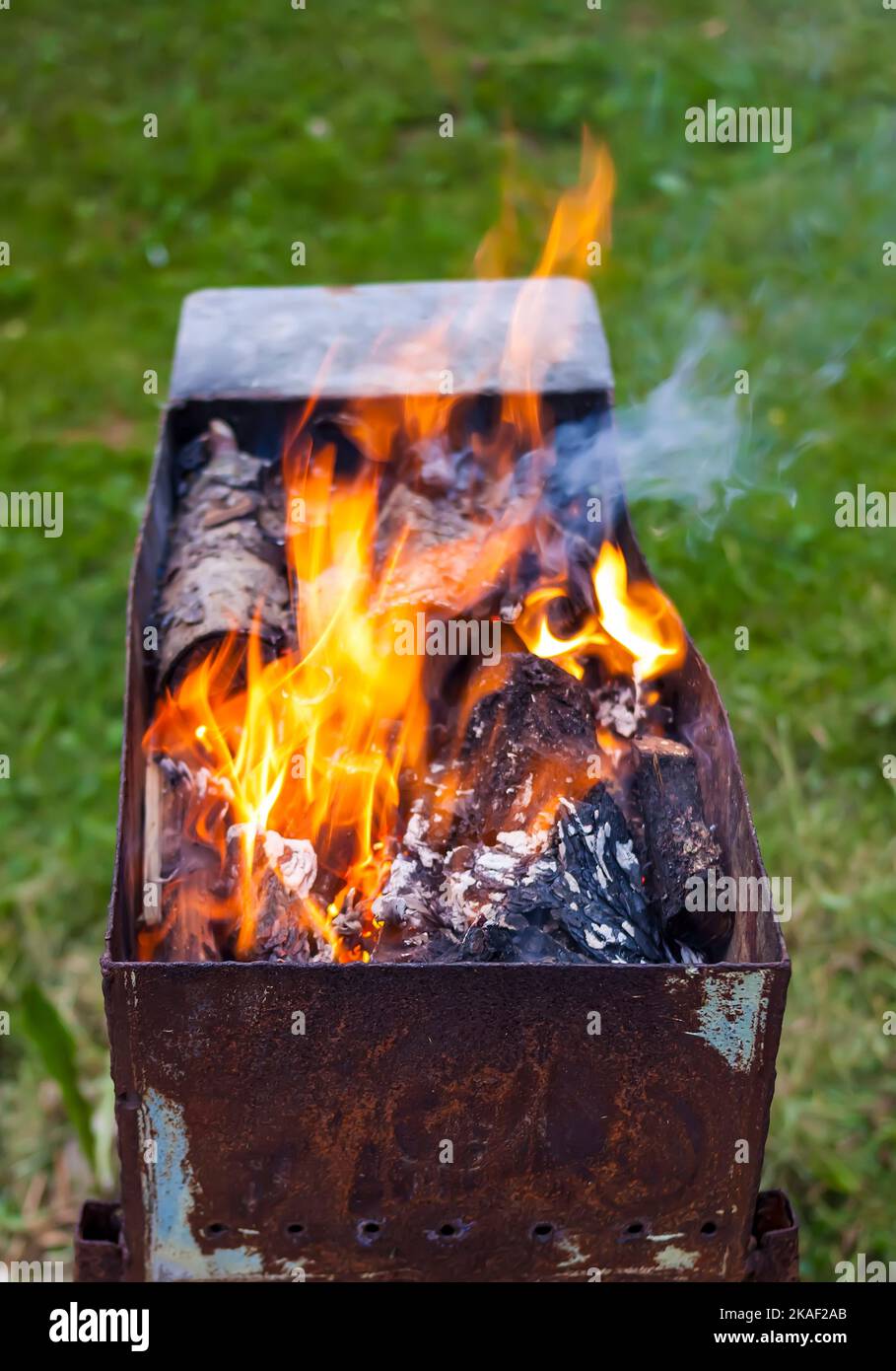 Flame of fire burning in the brazier Stock Photo - Alamy