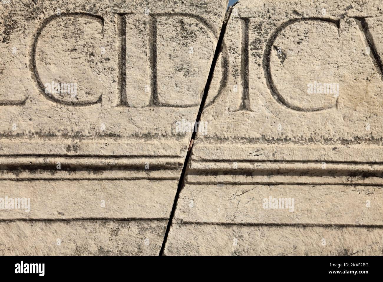 Latin inscription on broken stonework in the Pompeii ruins, Italy Stock ...