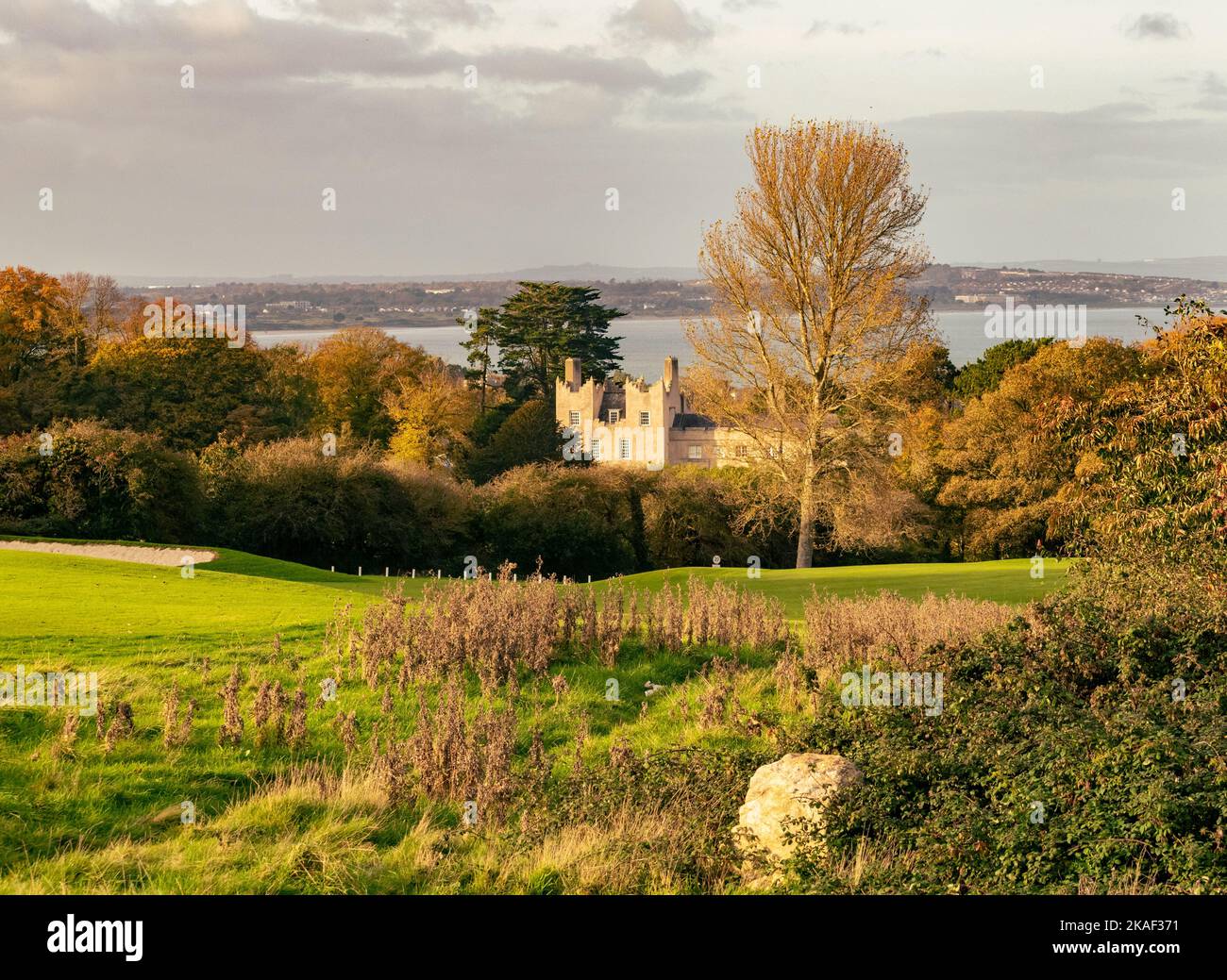 Howth Castle in the golden hour light on a November evening Stock Photo ...