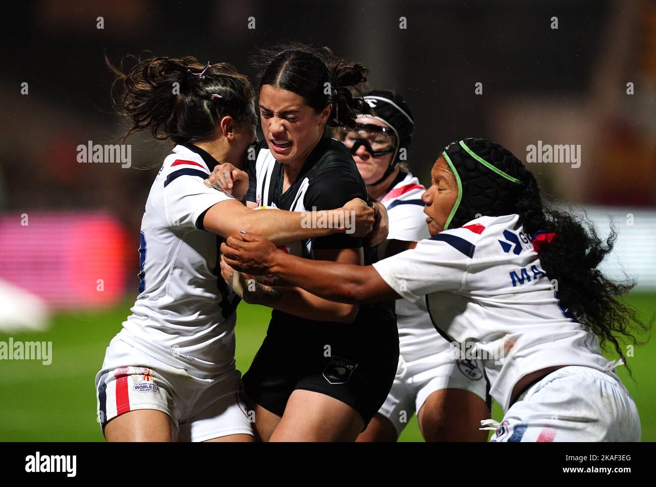 New Zealand's Katelyn Vaha'akolo is tackled by France's Margot Canal ...