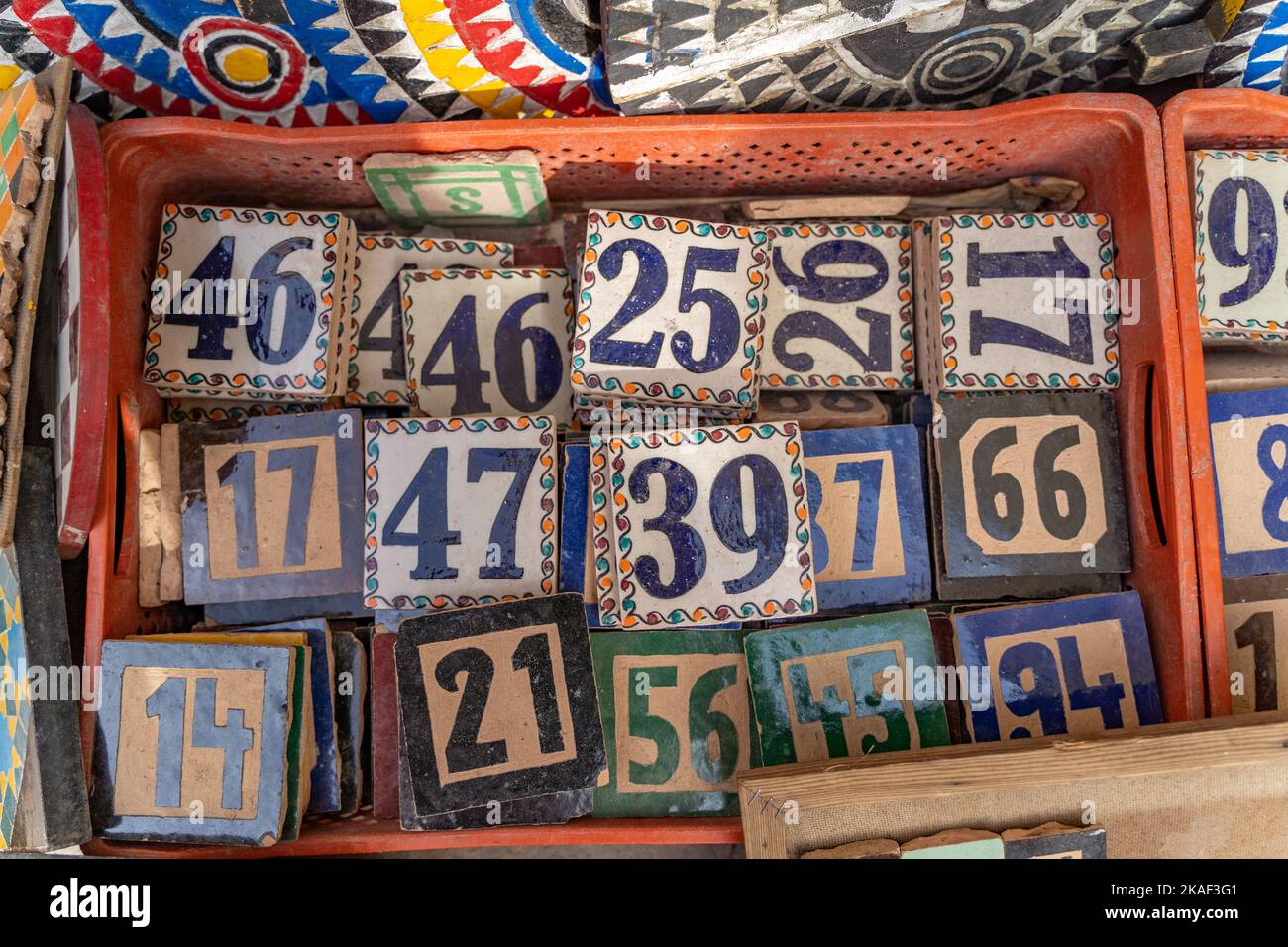 A top view of a lot of stones with numbers painted on them in an old ...
