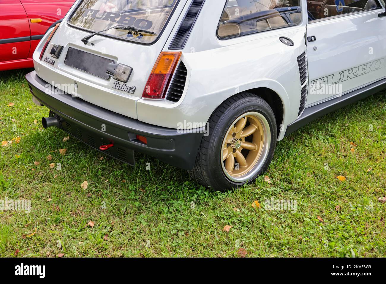 A closeup of details of the back of white vintage historic Renault 5 ...