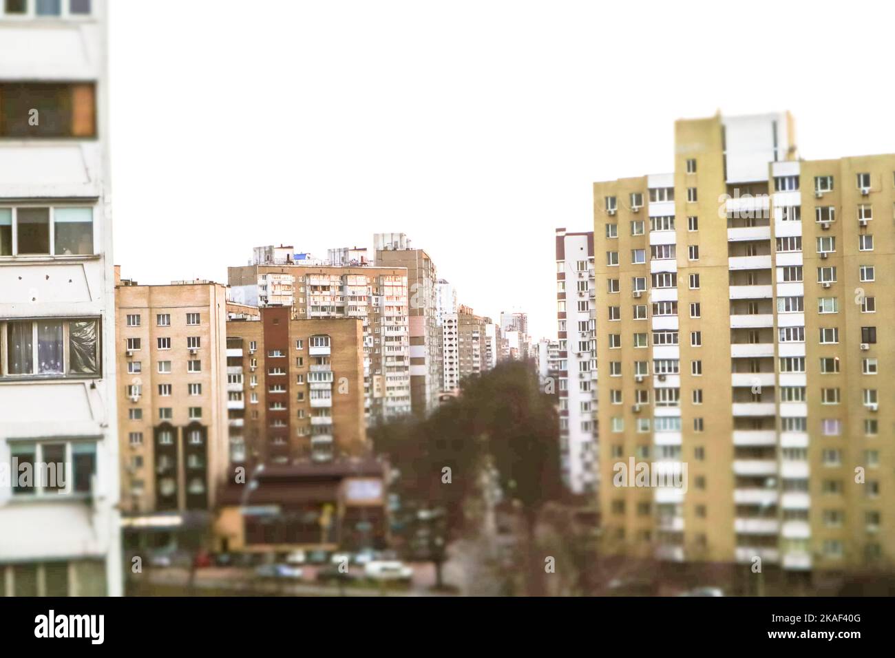 Apartment buildings in bedroom city town community. View from window on ...