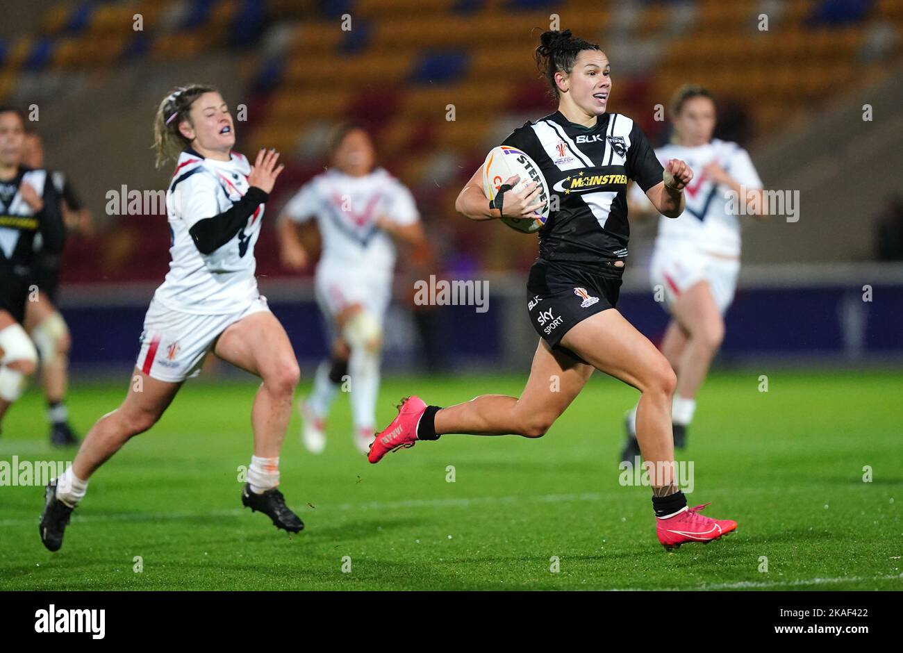 New Zealand's Shanice Parker runs in to score a try during the Women's ...