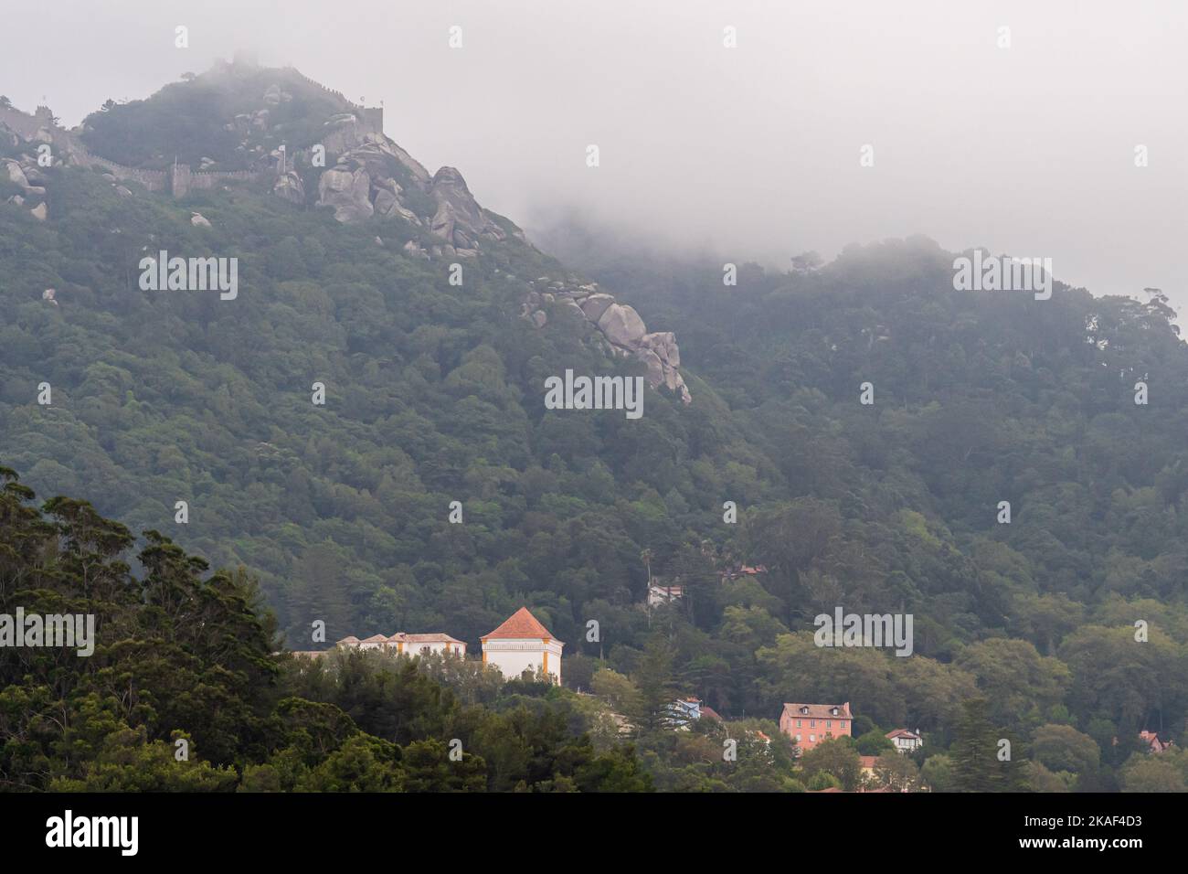 The Moorish castle in fog in the Sintra mountain range, Portugal Stock ...